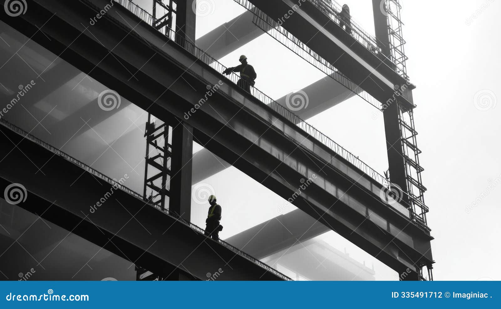 Two Construction Workers on a Steel Beam of a Building Stock ...