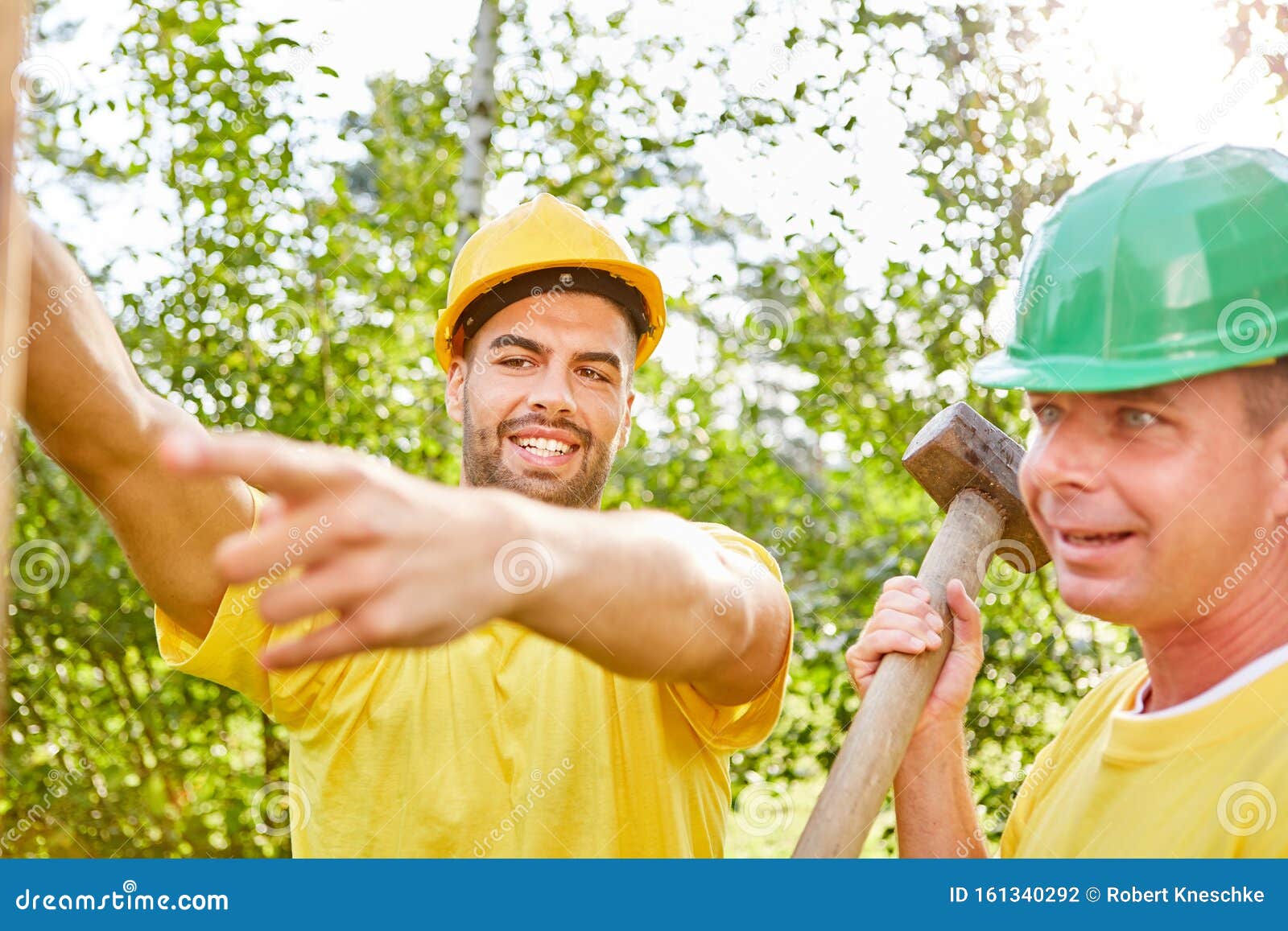 Two Construction Workers are Working in Teamwork Stock Photo - Image of ...