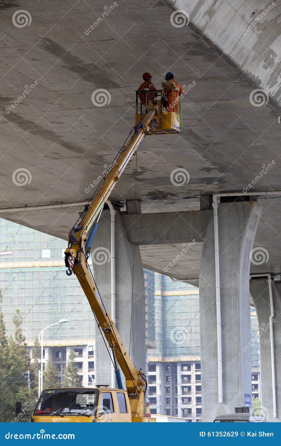 Two Construction Workers are Working Under a Road Editorial Stock Image ...