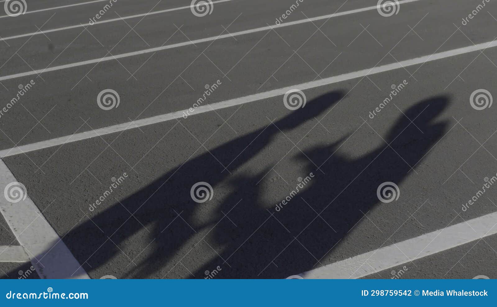 Two Contracting Shadows. HDR. Two Shadows on Asphalt are Talking and ...