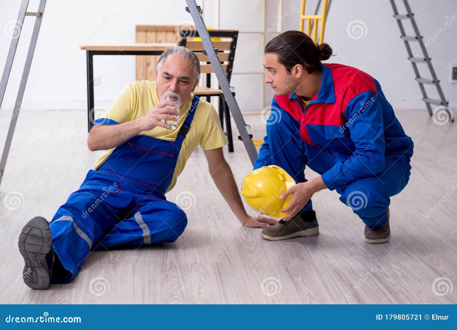 Two Contractors in First Aid Concept Stock Image - Image of ...