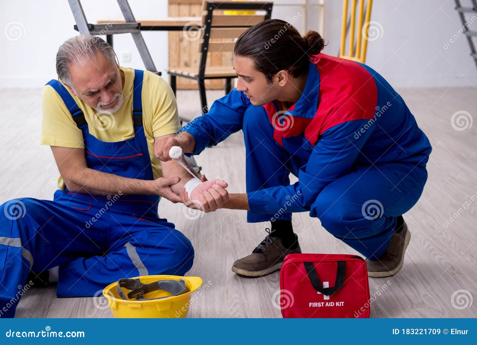 Two Contractors in First Aid Concept Stock Image - Image of bandaging ...