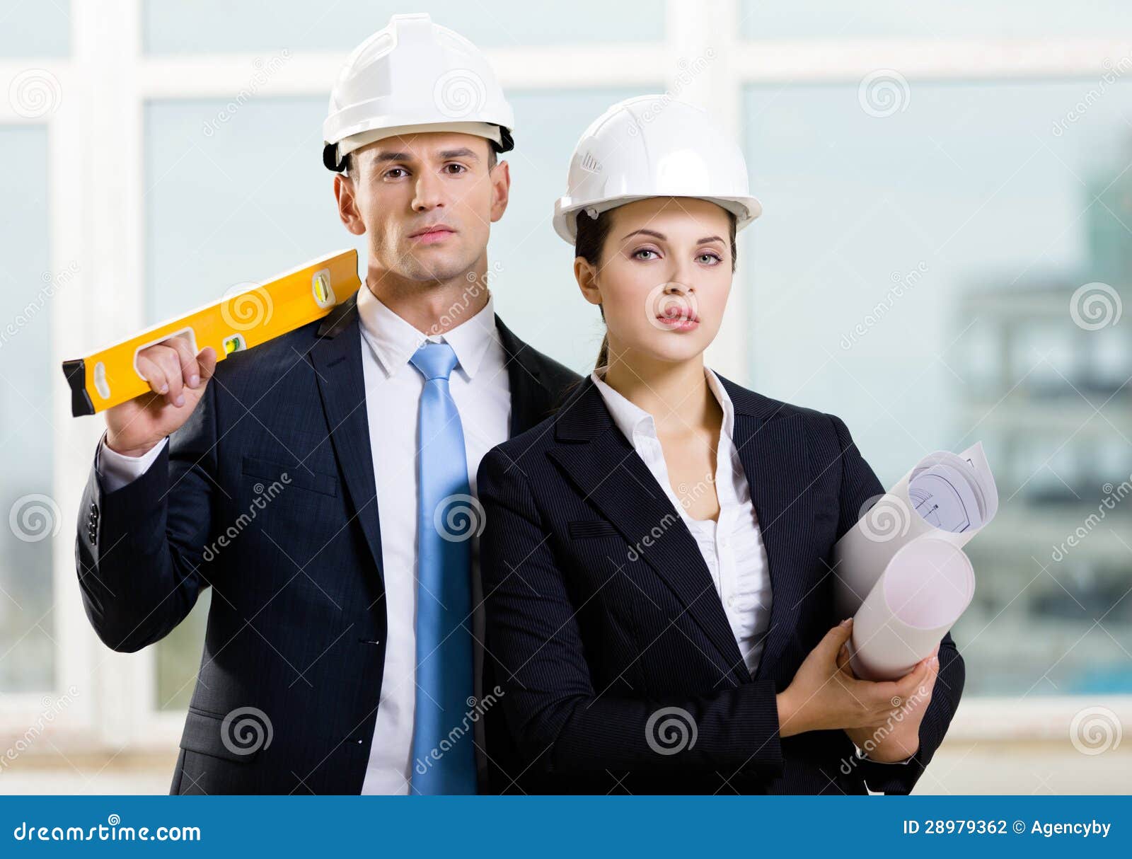 Two Contractors Keeping Level and Blueprints Stock Photo - Image of ...