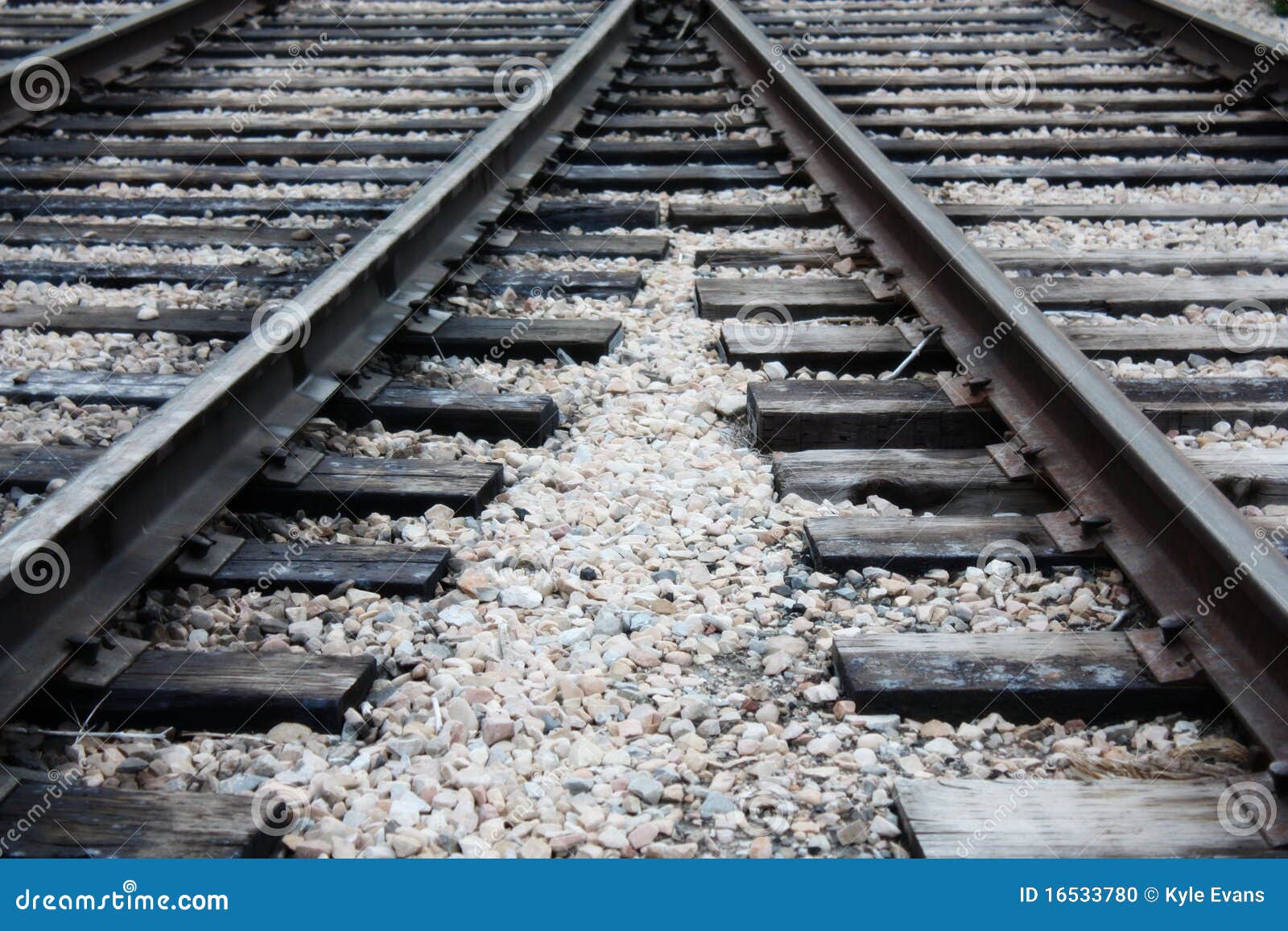 Two Converging Train Tracks Stock Photo - Image of rocks, travel: 16533780