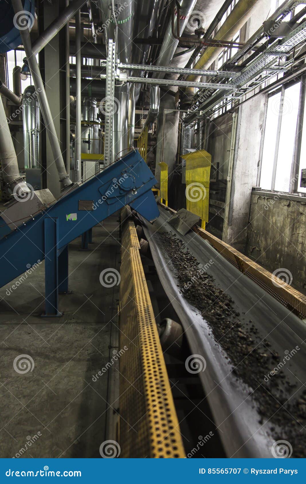 Two conveyors scraper stock image. Image of pouring, waste - 85565707