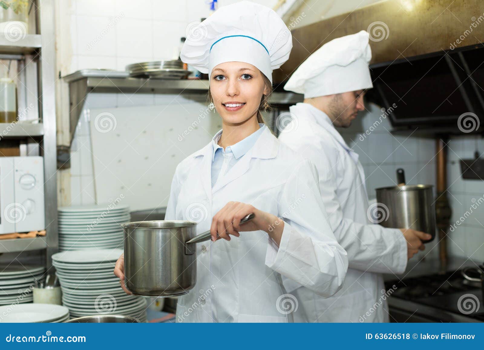 Two Cooks at Restaurant Kitchen Stock Photo - Image of business, cafe ...