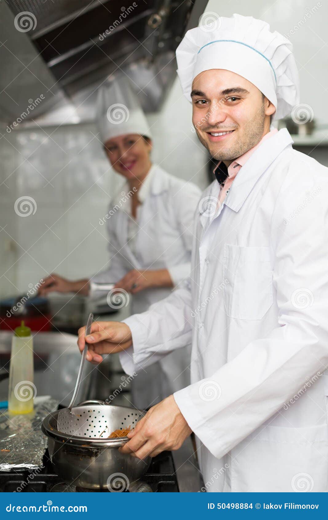 Two Cooks at Restaurant Kitchen Stock Photo - Image of commercial ...