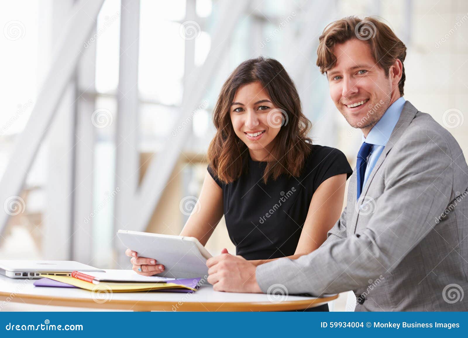 Two Corporate Business Colleagues at Work Smiling To Camera Stock Photo ...
