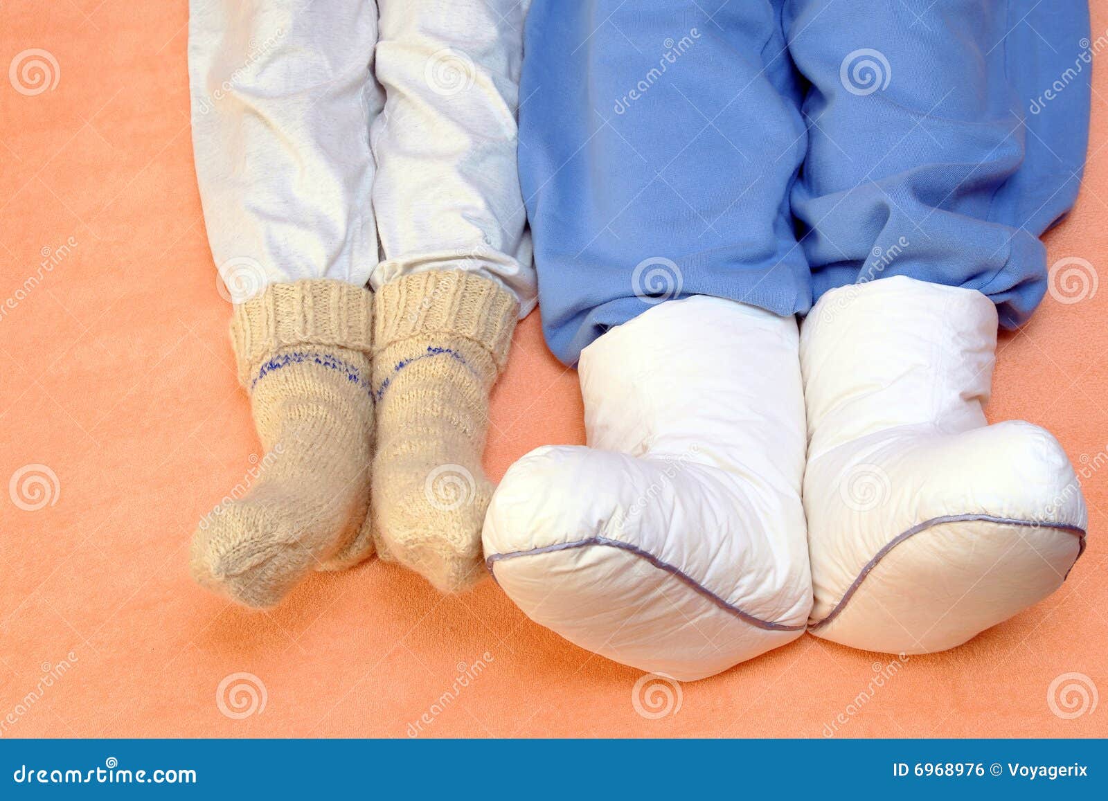 Two Couple s feet stock photo. Image of blanket, pair - 6968976