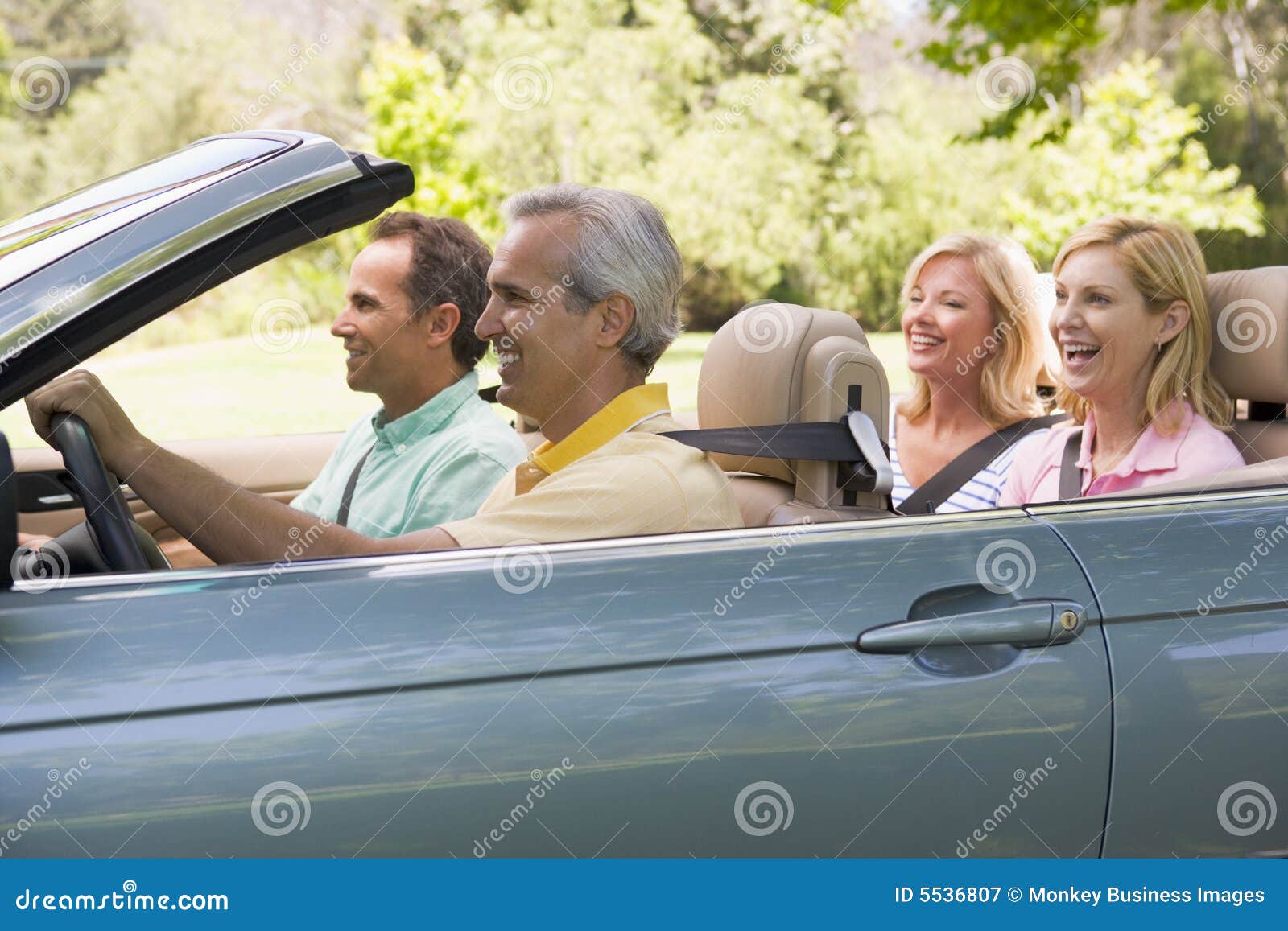 Two Couples in Convertible Car Smiling Stock Image - Image of forties ...