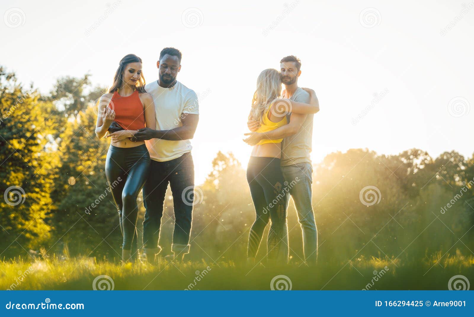 Two Couples Dancing Kizomba during Sunset in a Park Stock Image - Image ...