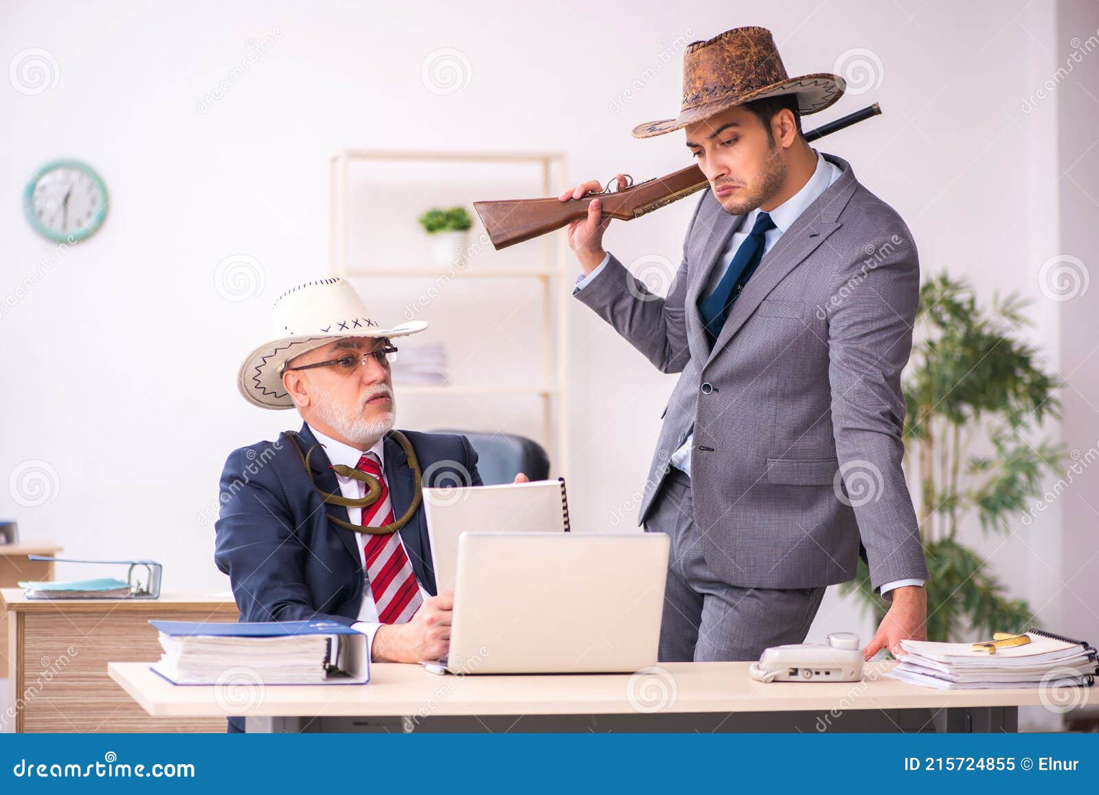 Two Male Cowboy Employees in Funny Concept Stock Image - Image of suit ...