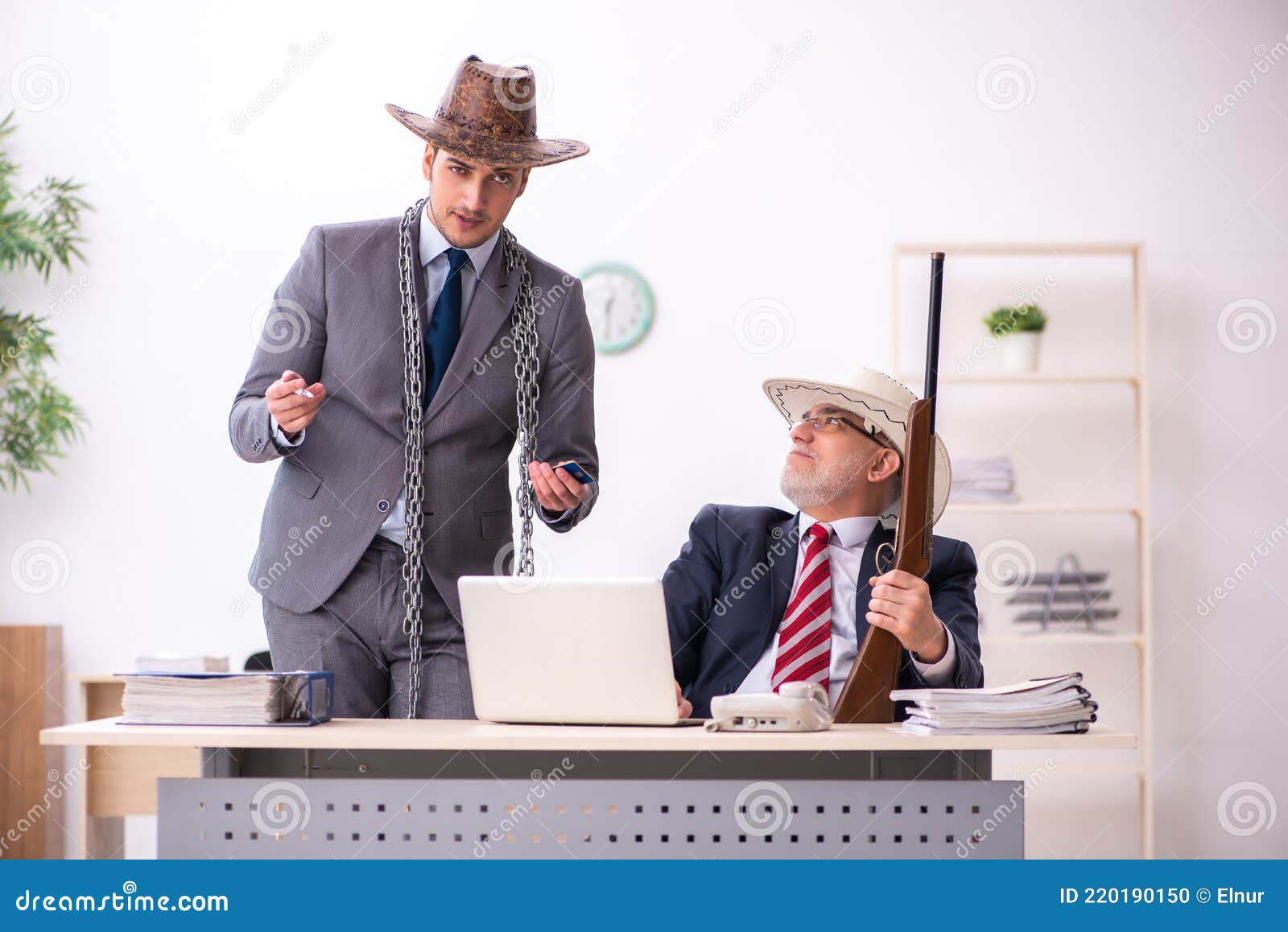 Two Male Cowboy Employees in Funny Concept Stock Photo - Image of boss ...