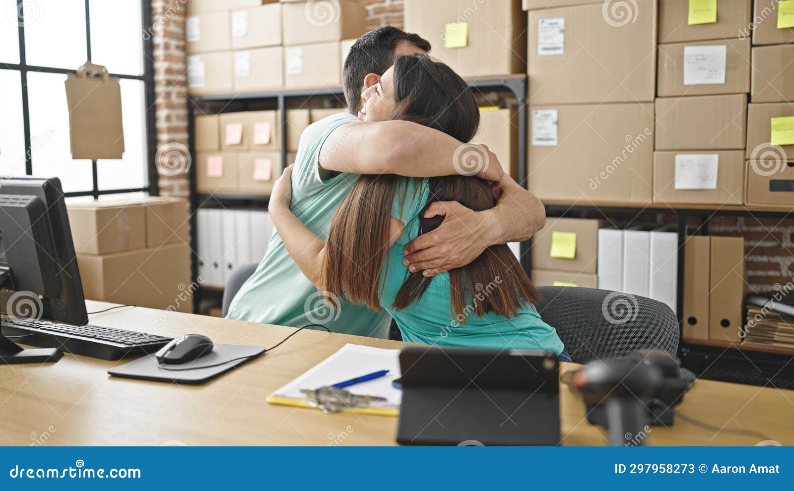 Two Coworkers Agreeing with a Hug at Ecommerce Office Stock Image ...