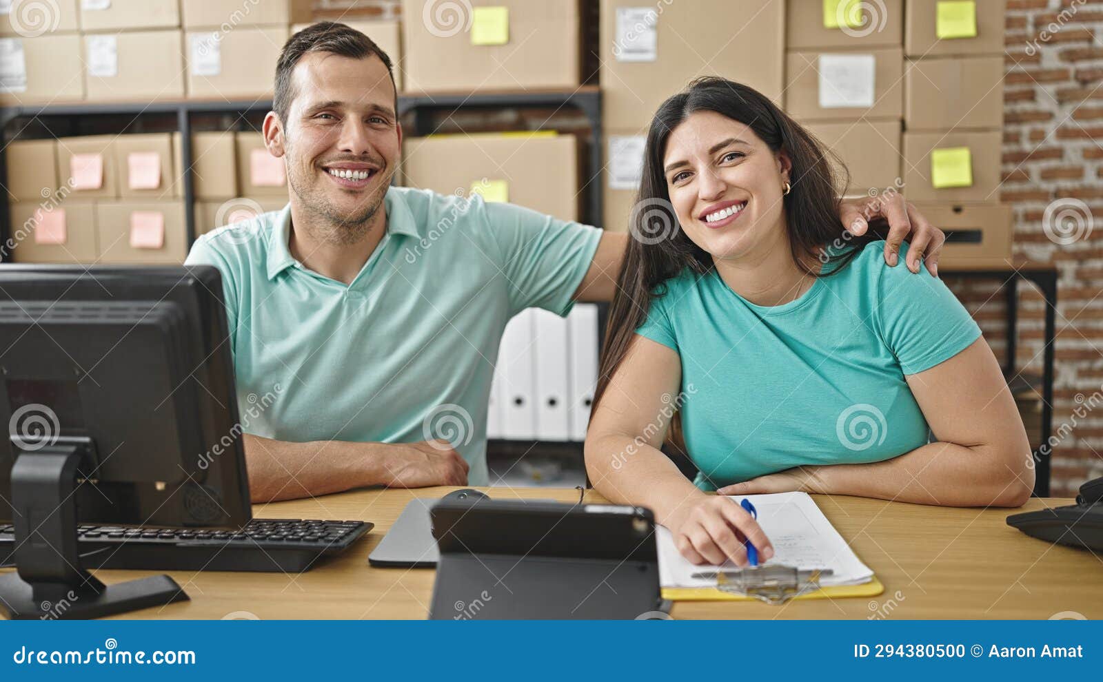 Two Coworkers Working Using Computer at Ecommerce Office Stock Photo ...