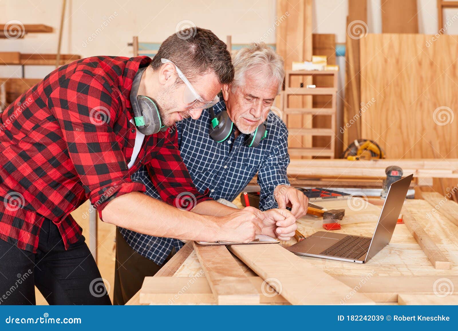 Craftsman in Teamwork at the Planning Stock Image - Image of computer ...