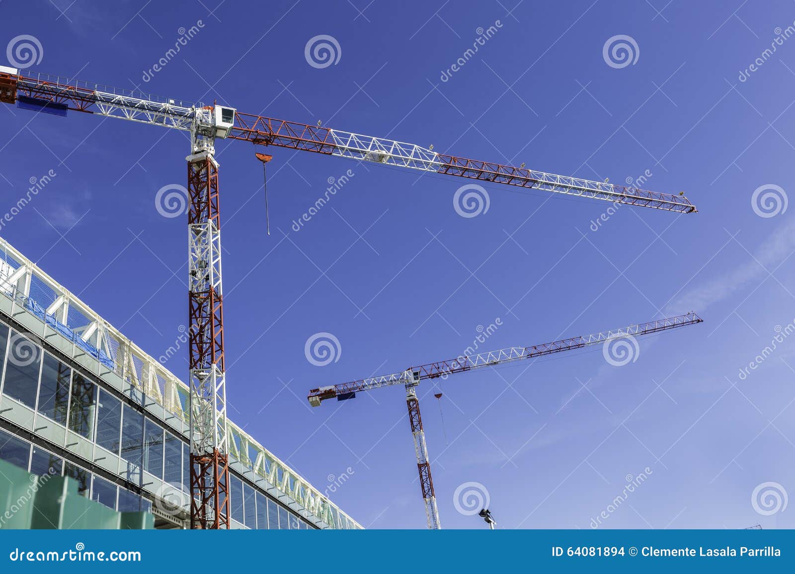 Two Cranes in Construction Site Stock Photo - Image of geometric ...