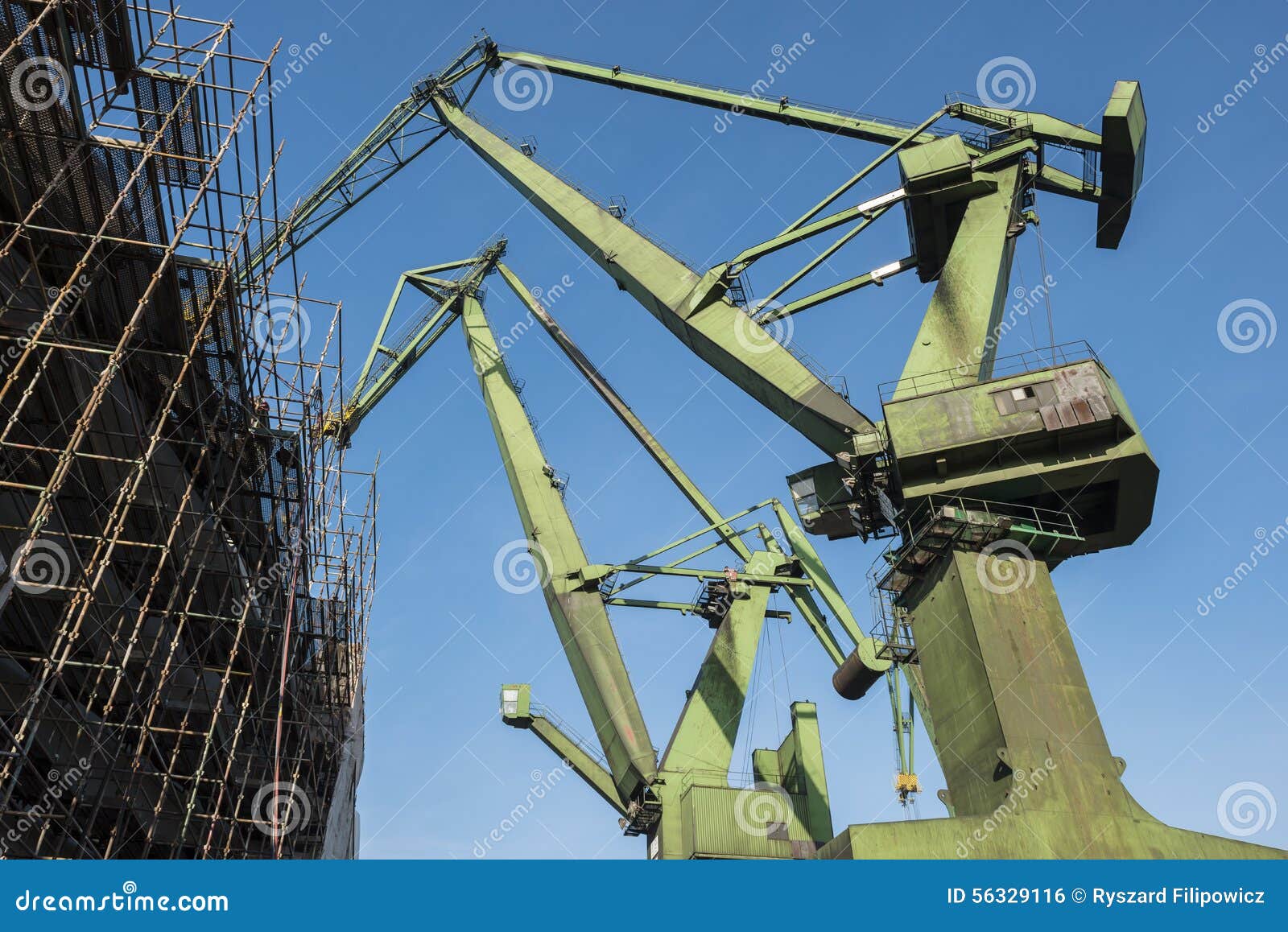 Two Cranes in Front of the Scaffold. Stock Photo - Image of industry ...
