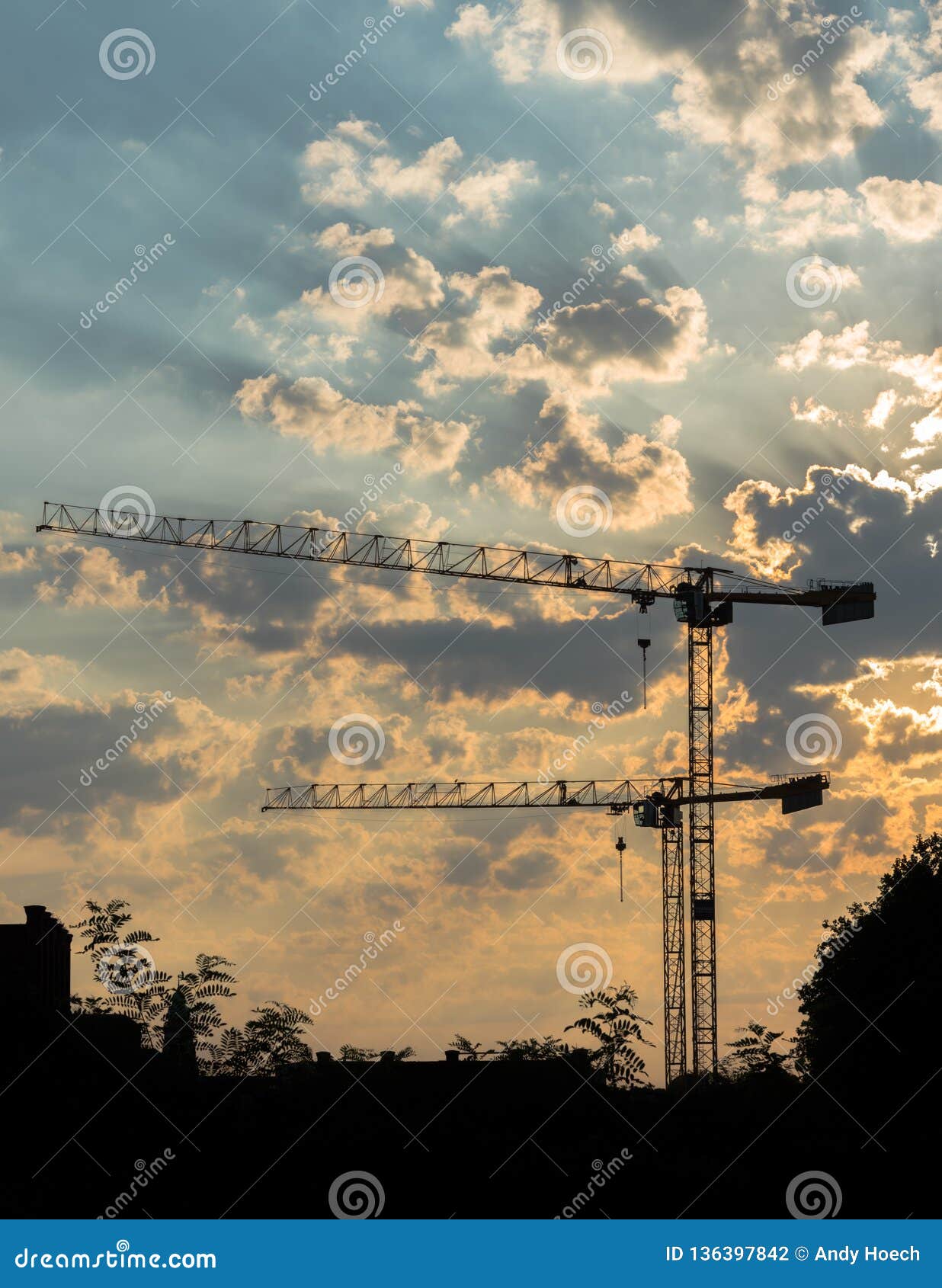 Two Cranes at Sunset at the Construction Site Stock Photo - Image of ...