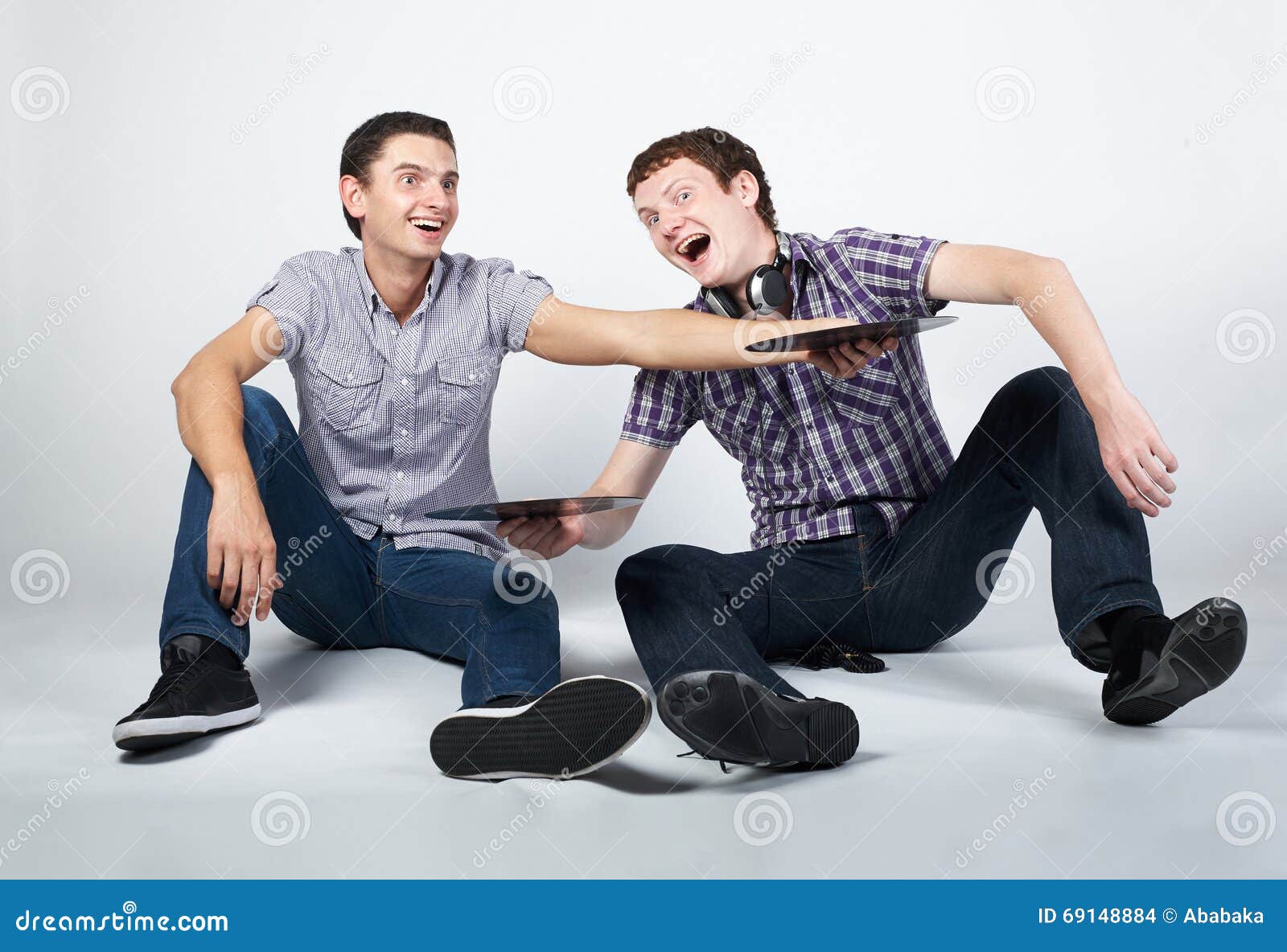 Two crazy guys with plates stock photo. Image of portrait - 69148884