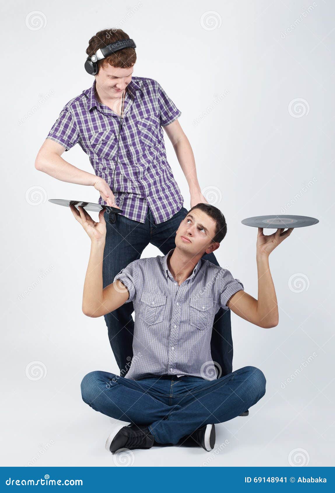 Two crazy guys with plates stock image. Image of record - 69148941