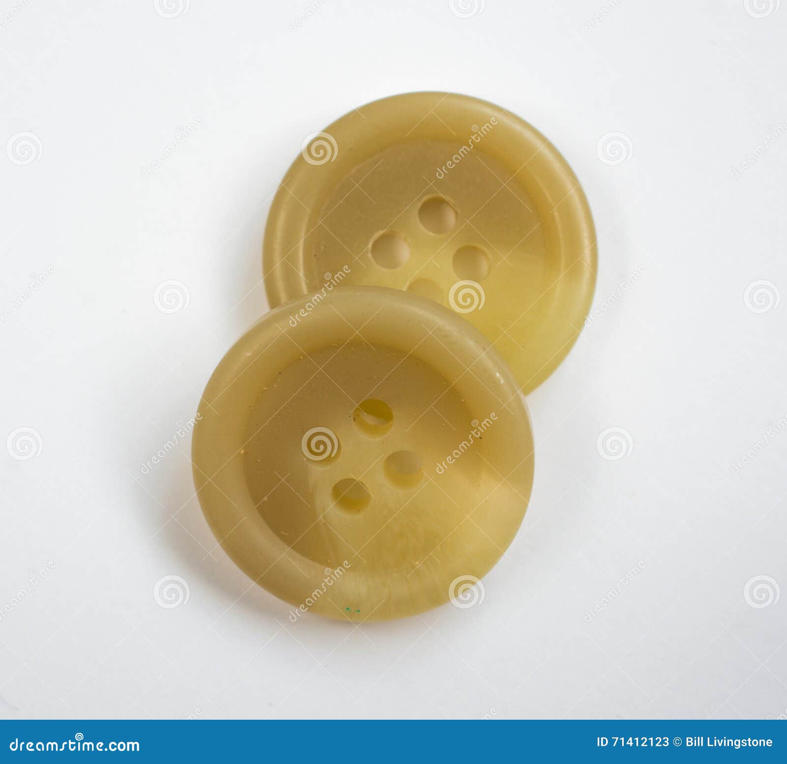 Two Cream Colored Plastic Buttons Isolated on White Stock Image - Image ...