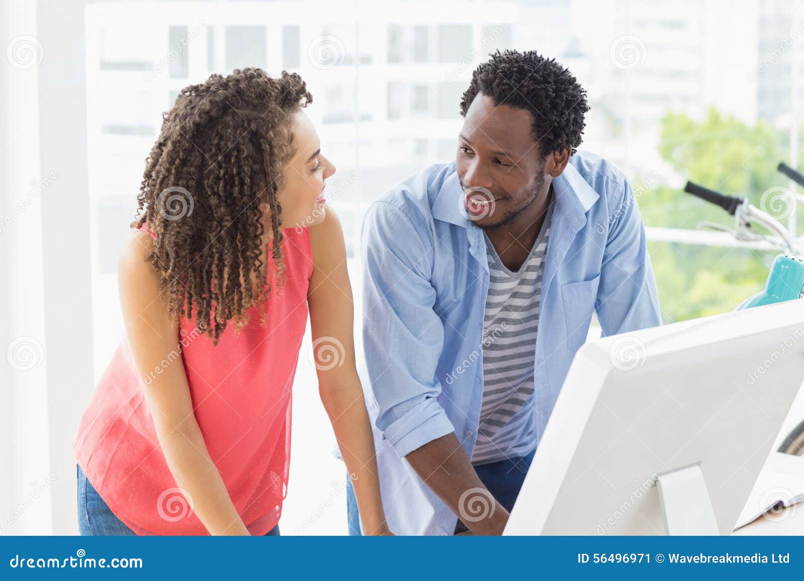 Two Creative Business Colleagues Talking Together Stock Image - Image ... Two Creative Business Colleagues Talking Together Stock Image - Image ...