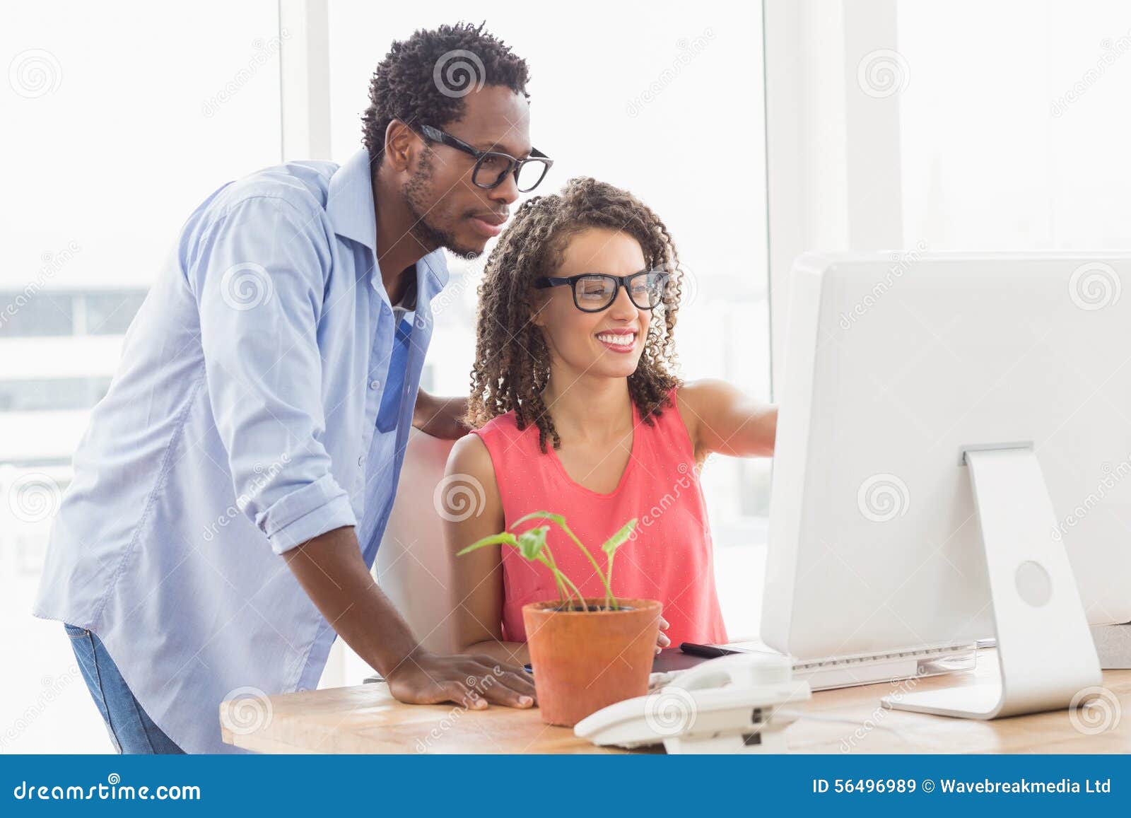 Two Creative Business Colleagues Working on the Computer Stock Image ...