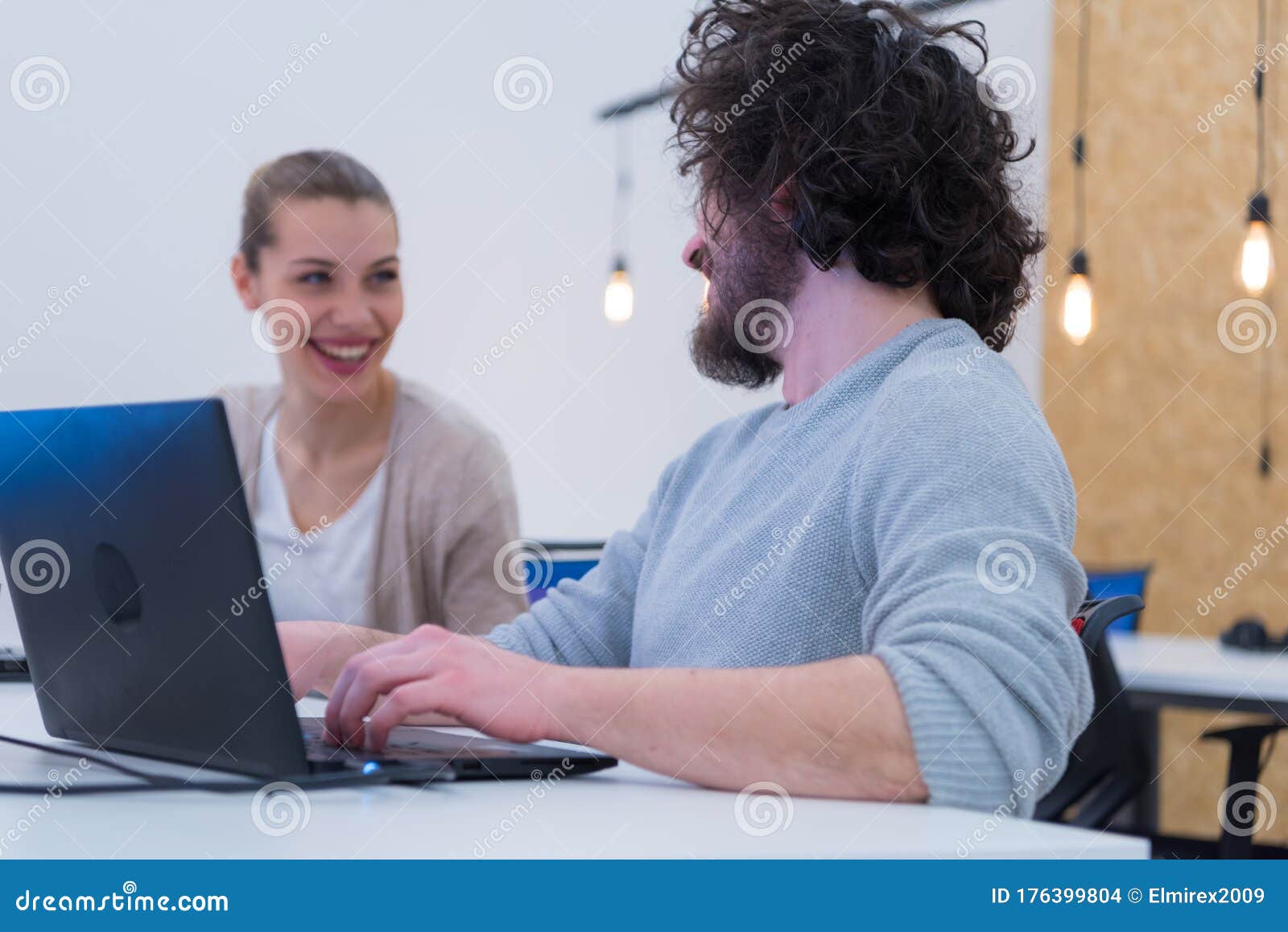 Two Creative Office Workers Collaborate Together To Discuss Main Ideas ...