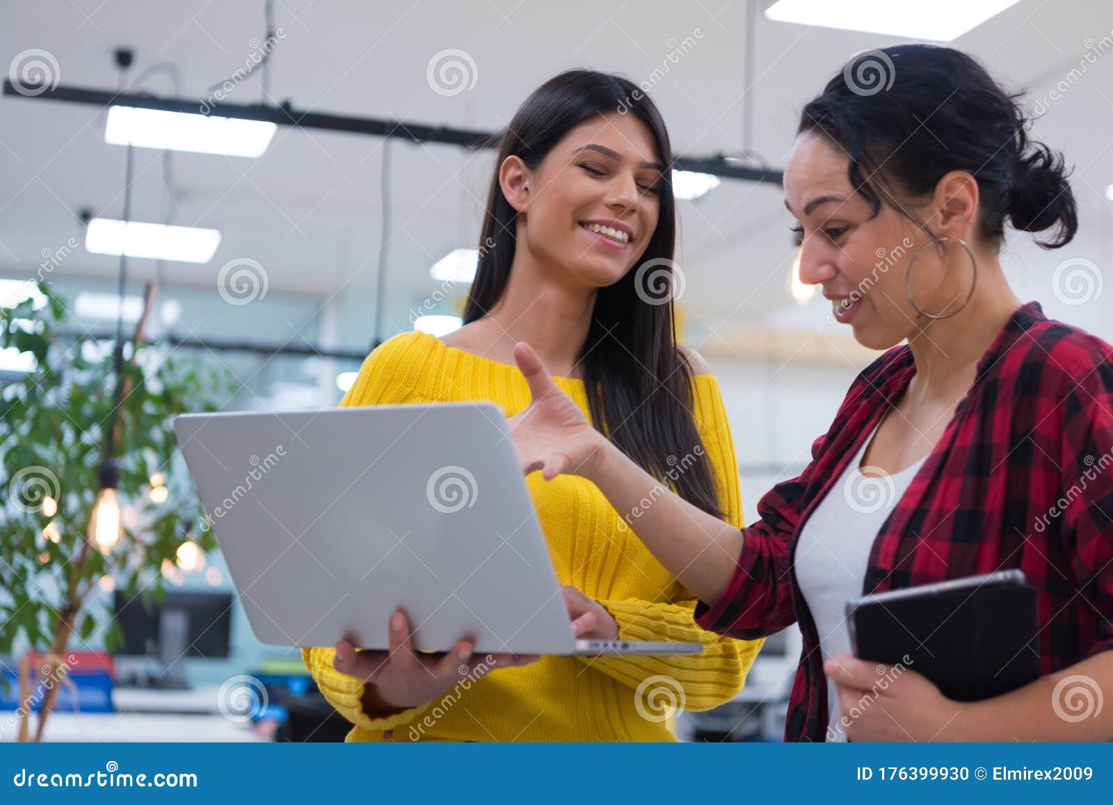 Two Creative Office Workers Collaborate Together To Discuss Main Ideas ...