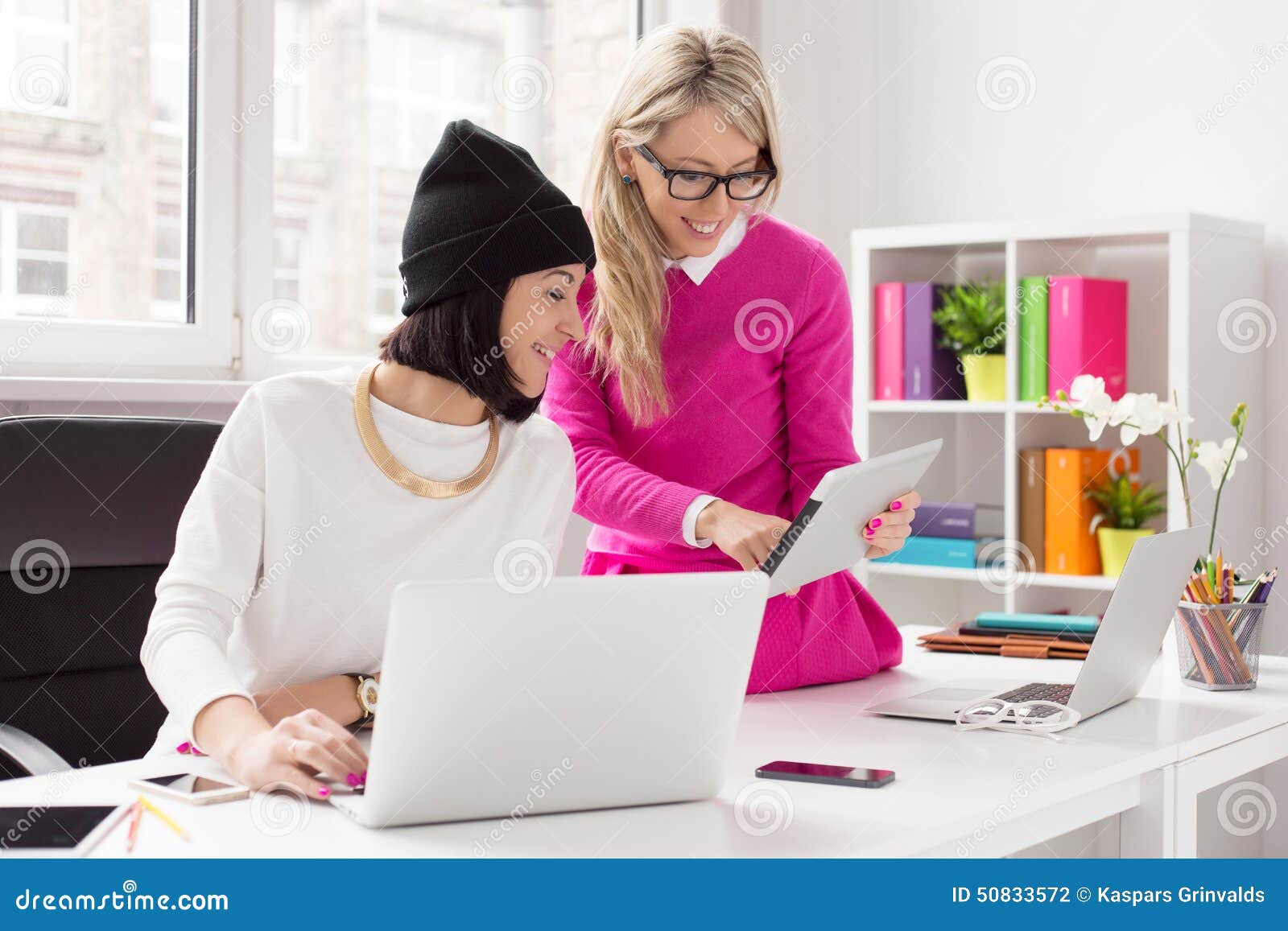 Two Creative Women Working Together in Office Stock Photo - Image of ...