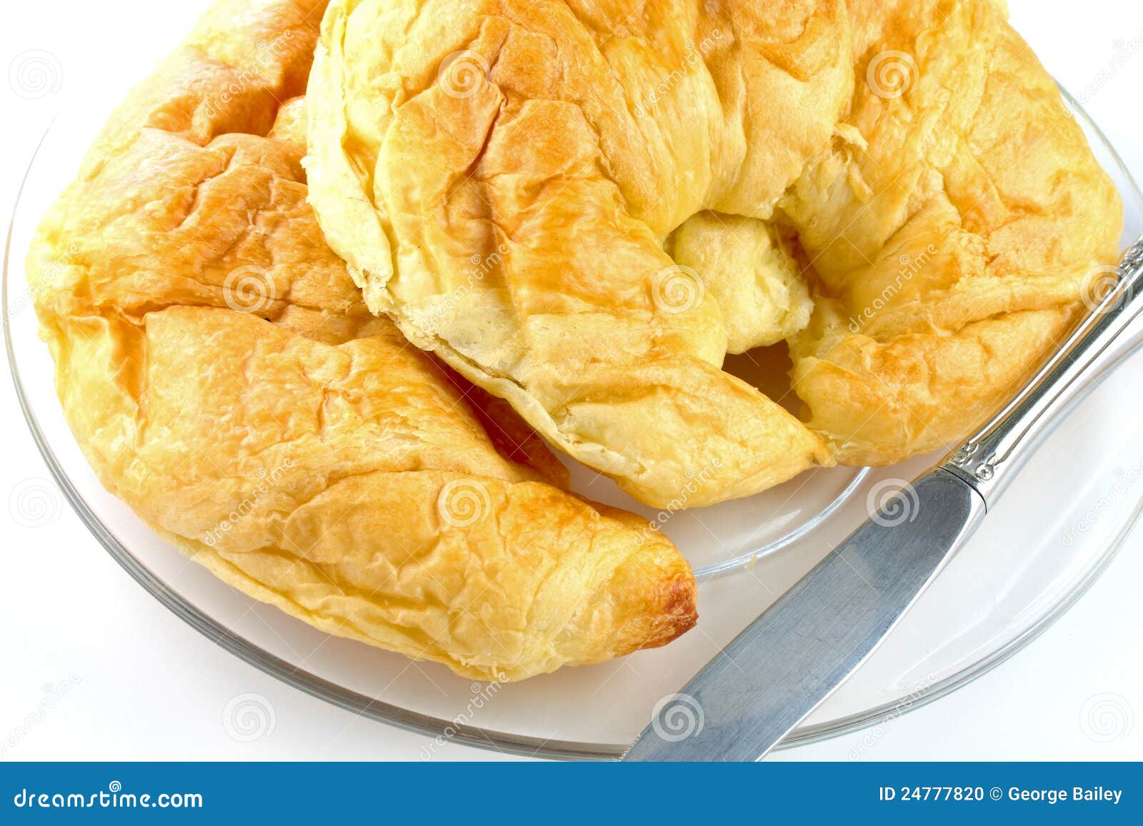 Two croissants on plate stock photo. Image of bread, plate - 24777820