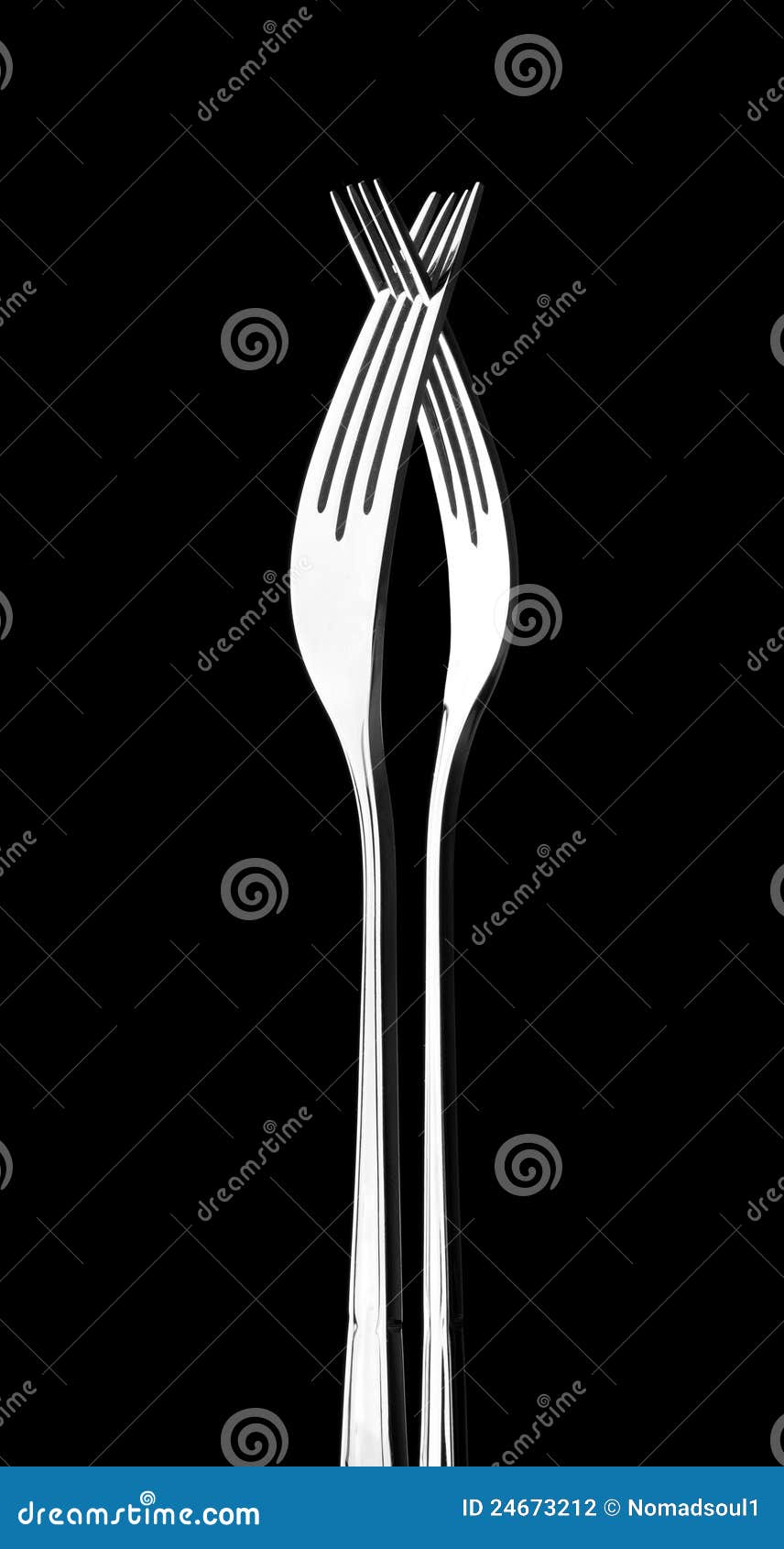 Two crossed silver forks stock photo. Image of crossed - 24673212