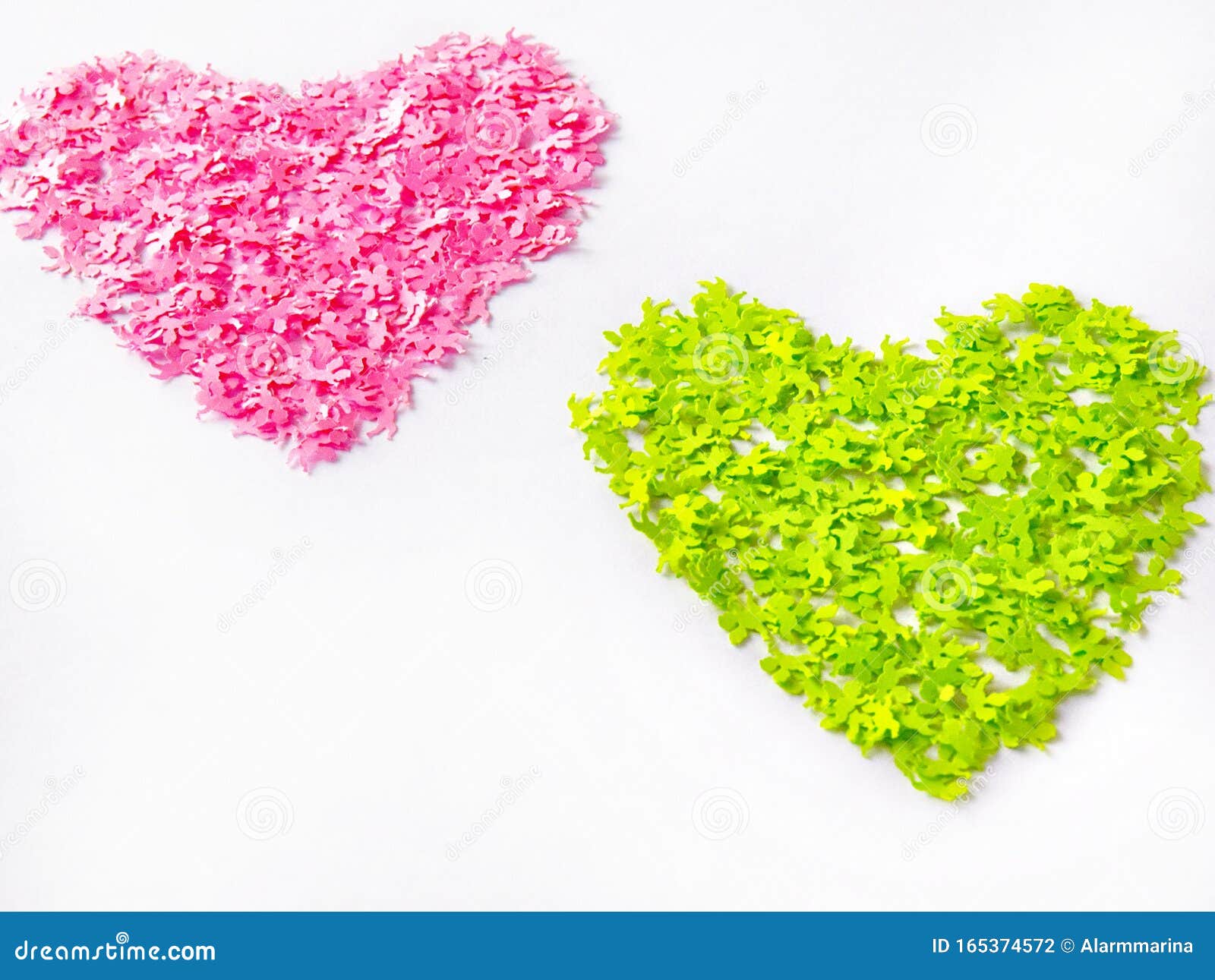 Two Cupid Hearts One Green, the Other Pink on a White Background ...