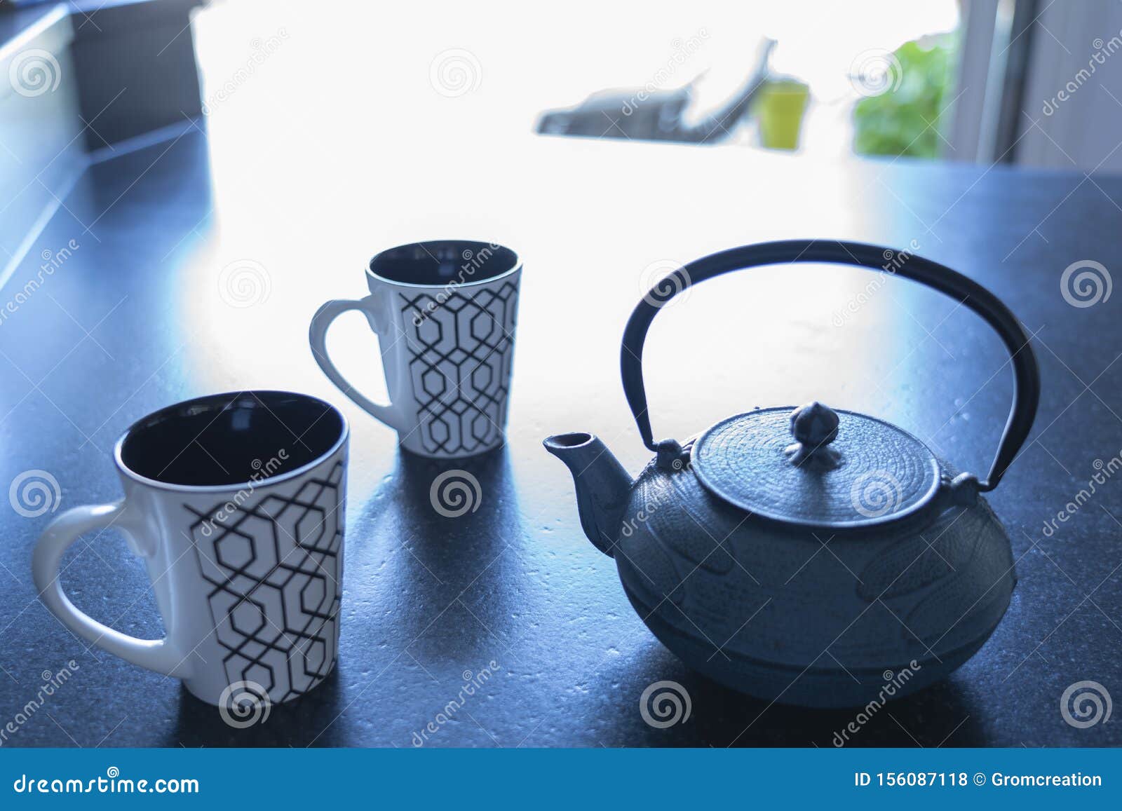 Two Cups and a Cast Iron Tea Pot Stock Photo - Image of organic, cups ...