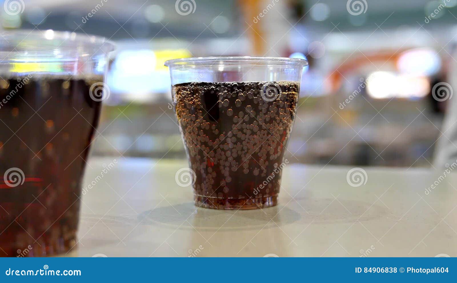 Two Cups of Coca Cola on Table Stock Footage - Video of cold, brown ...
