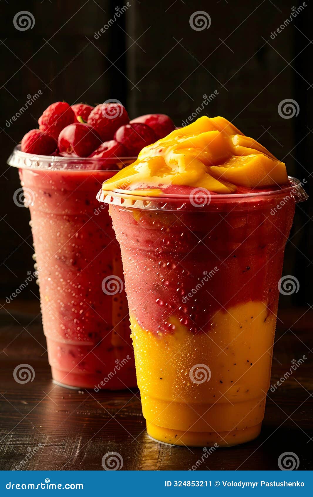 Two Cups of Fruity Smoothies on a Wooden Table Stock Image - Image of ...