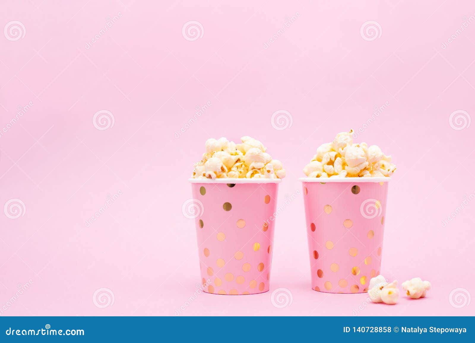 Two Cups of Popcorn on a Pink Background Stock Photo - Image of closeup ...