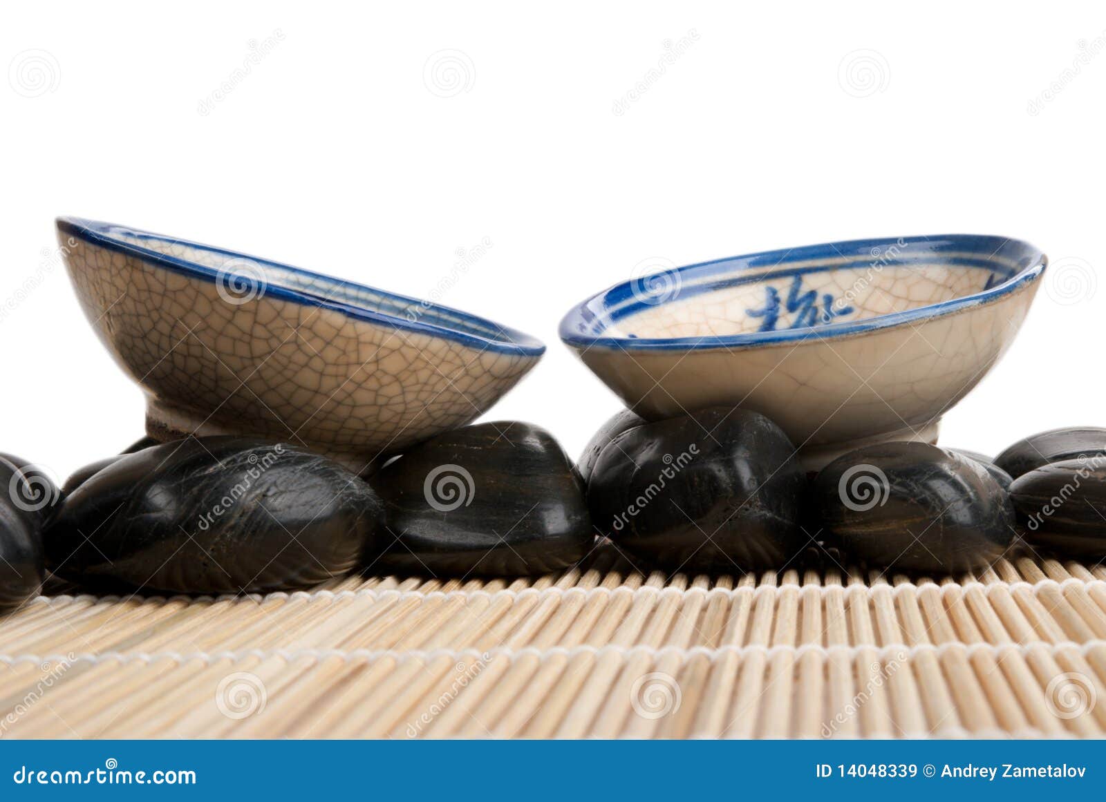Two cups and stones on mat stock image. Image of glitter - 14048339