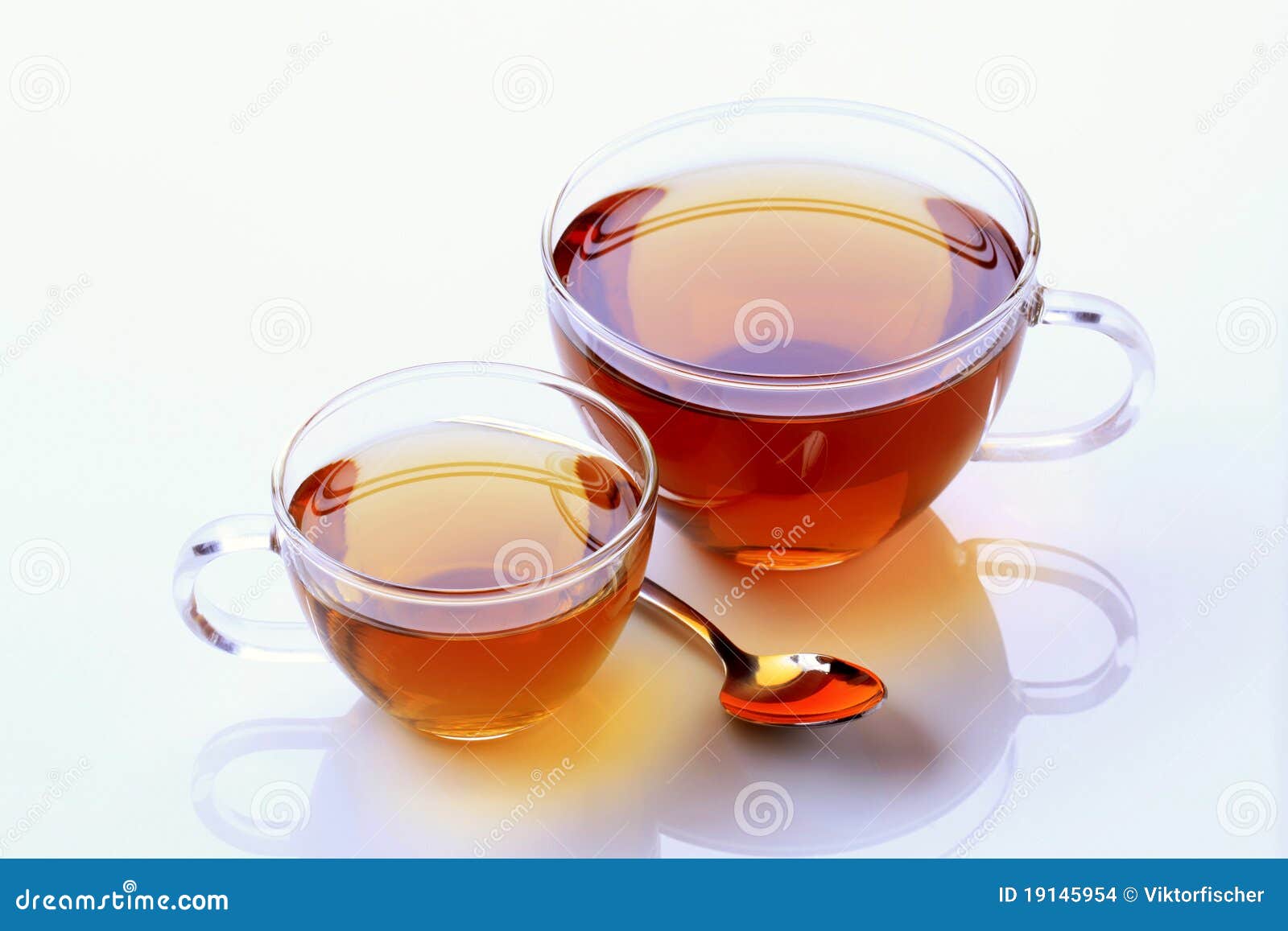 Two cups of tea stock photo. Image of green, glass, spoon - 19145954