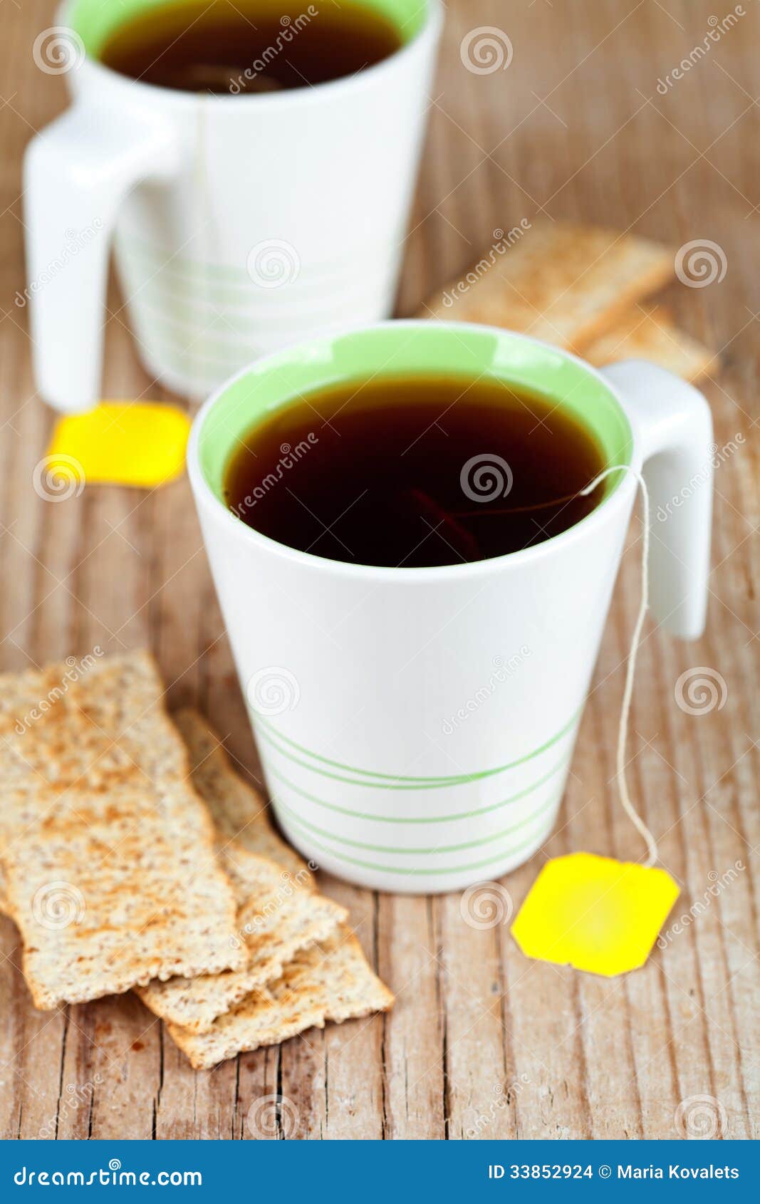 Two Cups of Tea and Crackers Stock Photo - Image of brown, wooden: 33852924