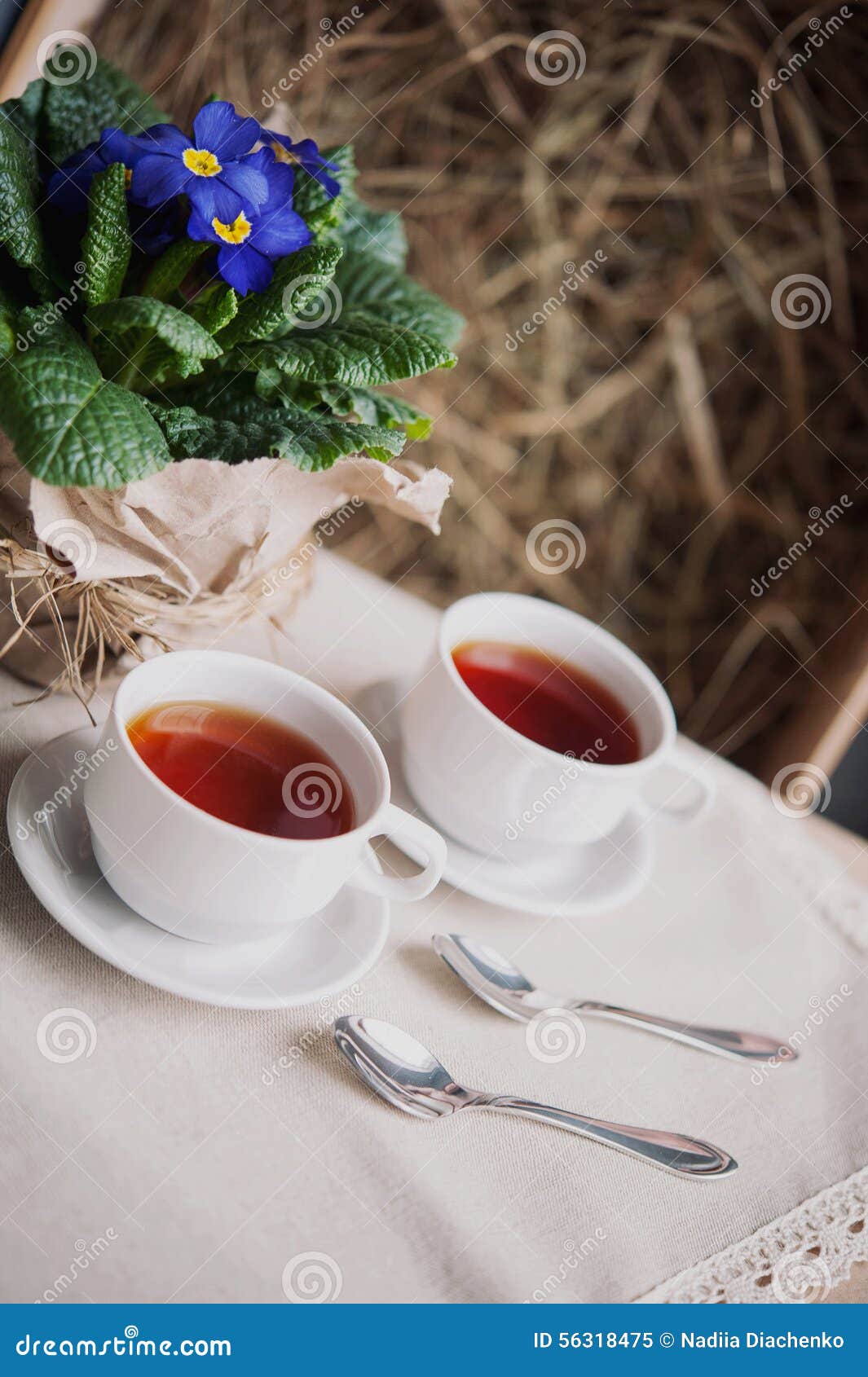 Two cups of tea stock image. Image of straw, black, flower - 56318475