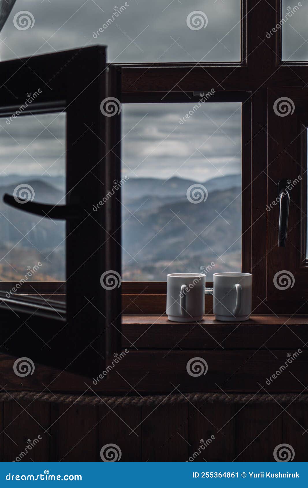Two Cups of Tea on Windowsill with Opened Window in Front of Mountains ...