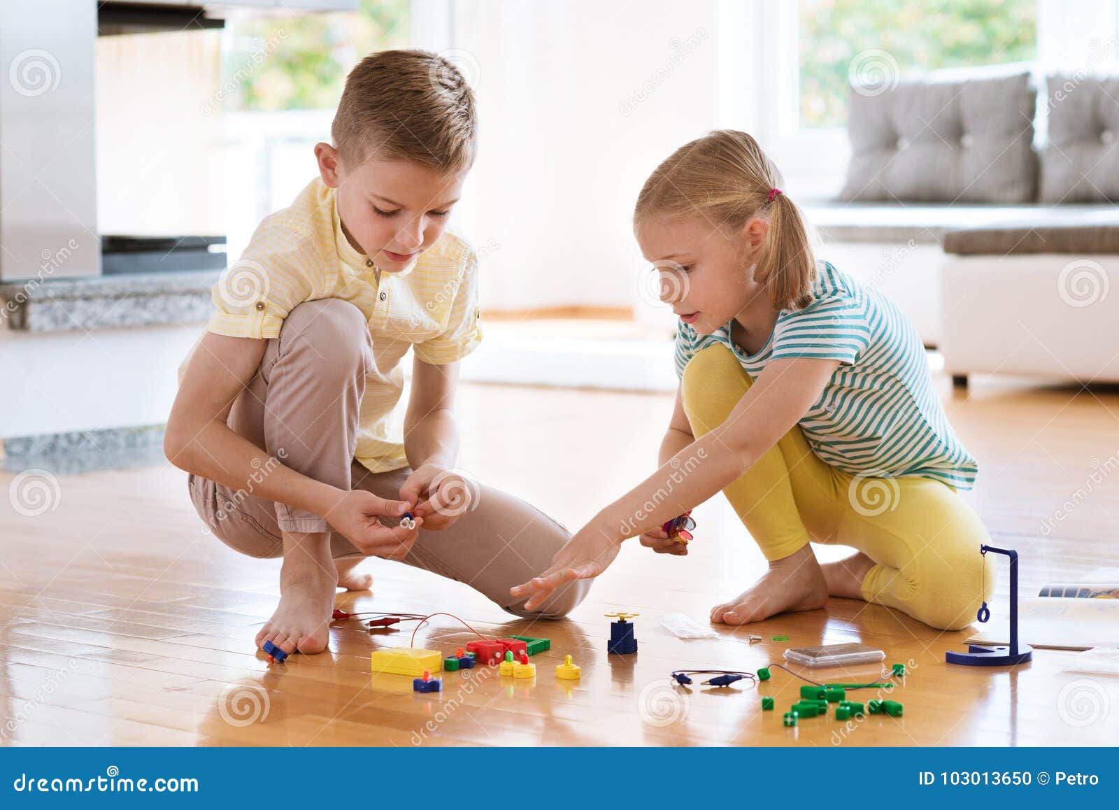 Two Curious Happy Children Playing with Game Stock Photo - Image of ...