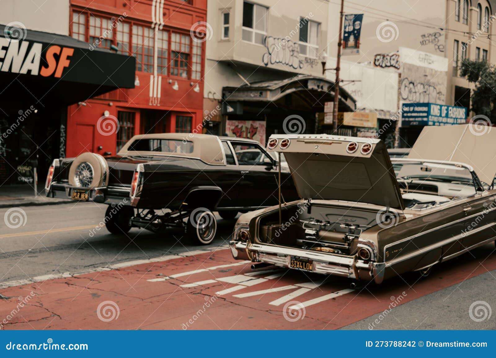 Two Customized Cars Rolling through a City Street Editorial Photography ...