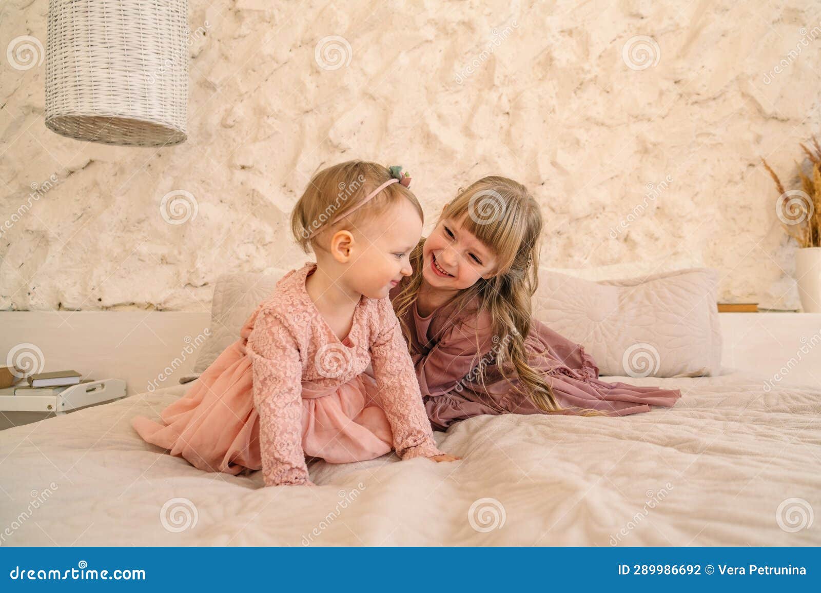 Two cute sisters portrait stock photo. Image of caucasian - 289986692