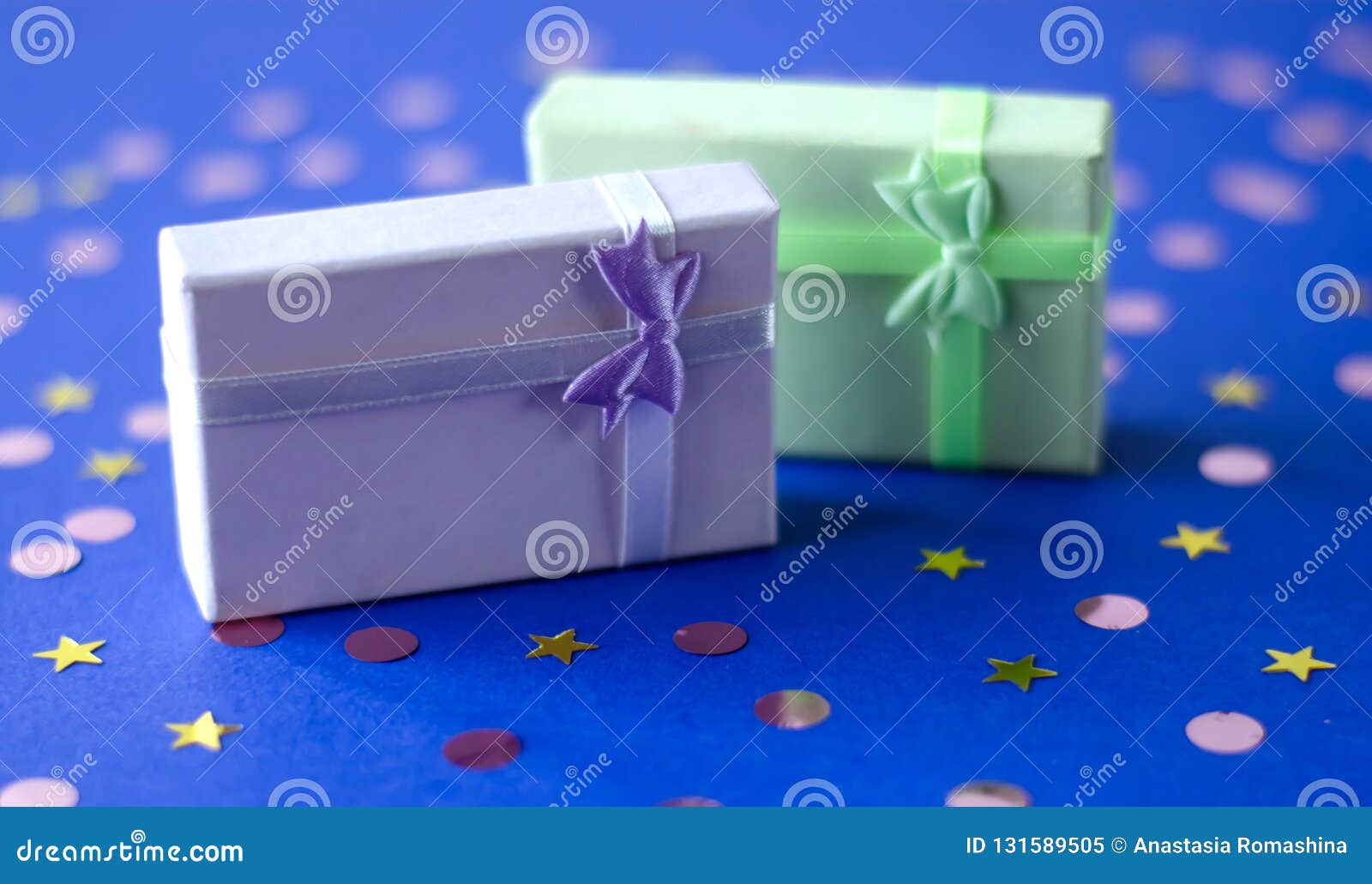 Two Boxes with Gifts on a Blue Background. Stock Image - Image of ...