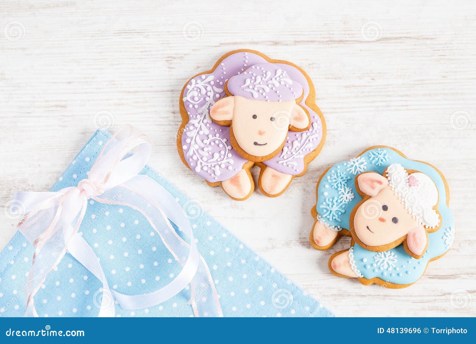 Two Cute Gingerbread Sheep on Blue Polka Dot Background Stock Photo ...