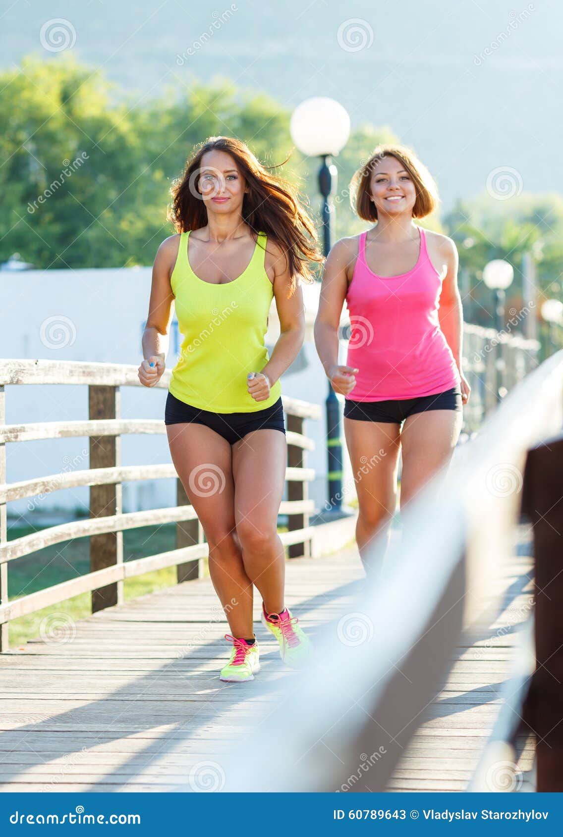 Two Cute Girls Jogging Outdoors Stock Image - Image of caucasian ...
