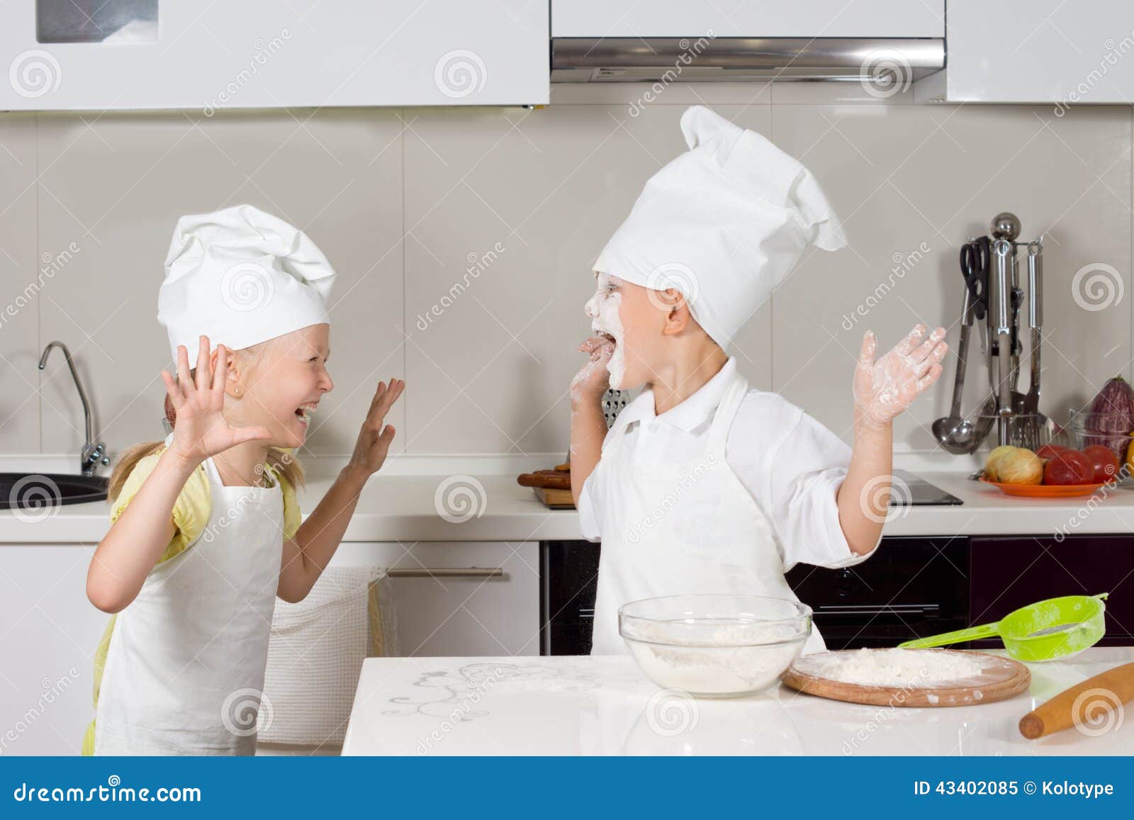 Two Cute Kids Dressed Up As Chefs Stock Image - Image of bowl, flour ...